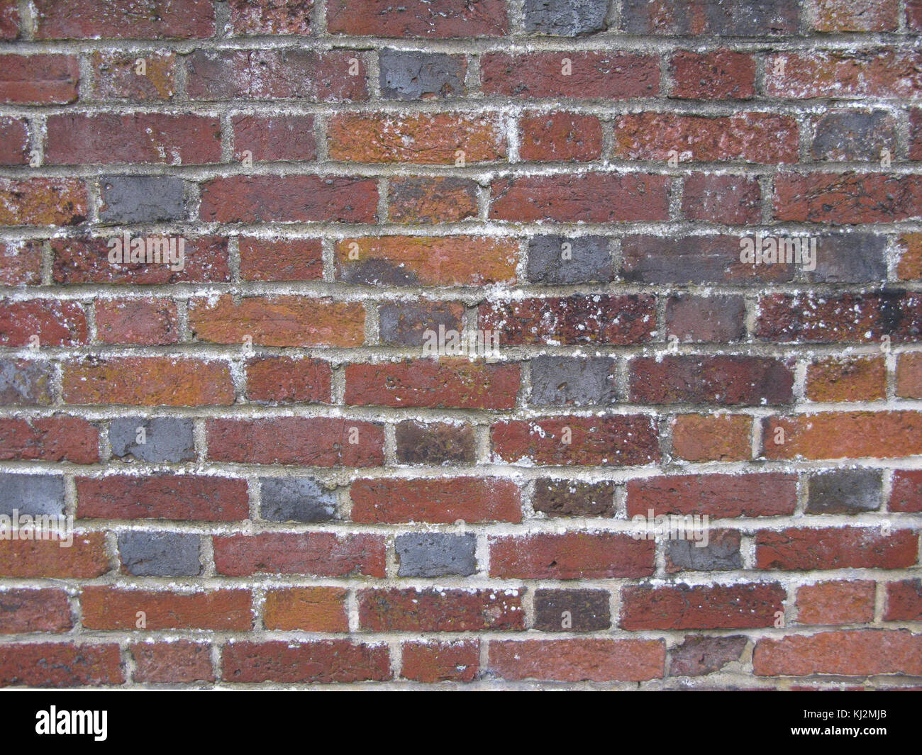 Red stone wall Stock Photo - Alamy