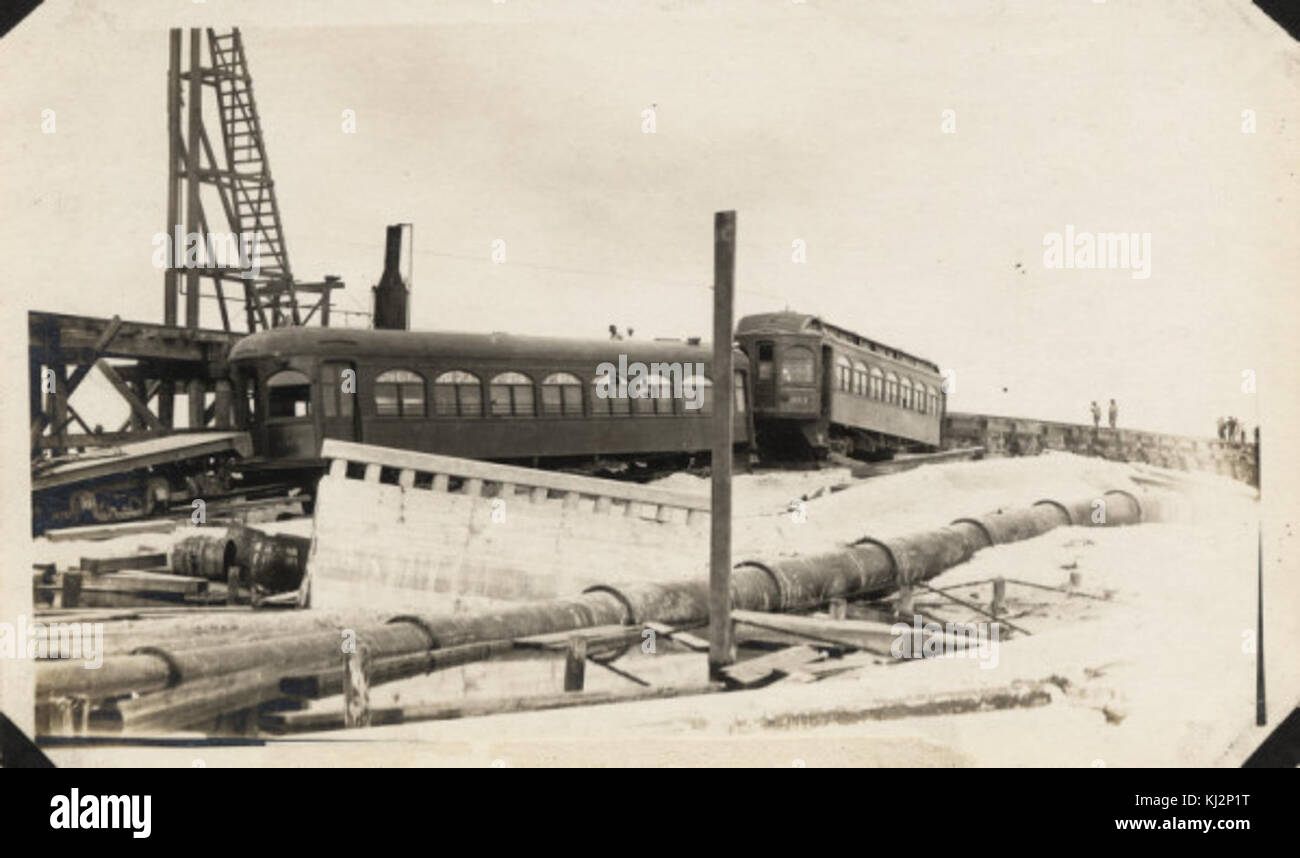 Two passengers cars being prepared for the temporary trestle Stock ...