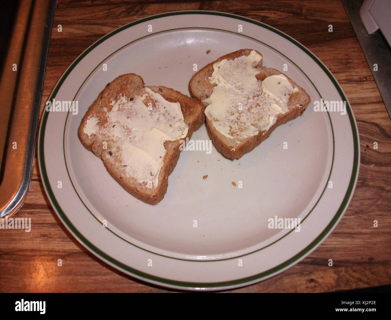 Toast buttered food Stock Photo - Alamy