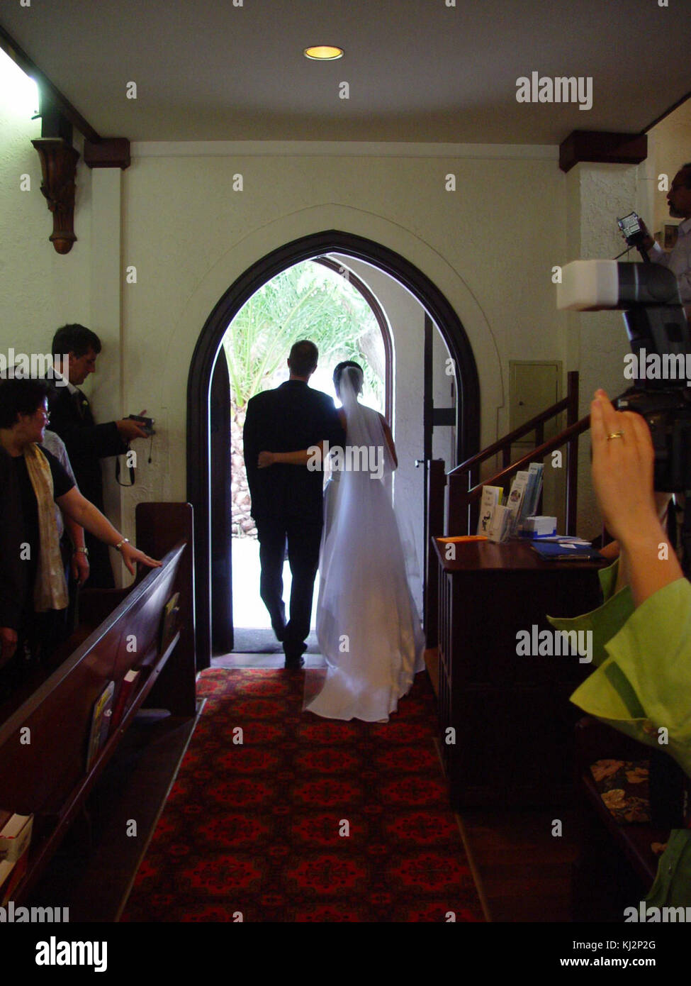 The happy couple exit the church St Johns Lutheran Stock Photo - Alamy