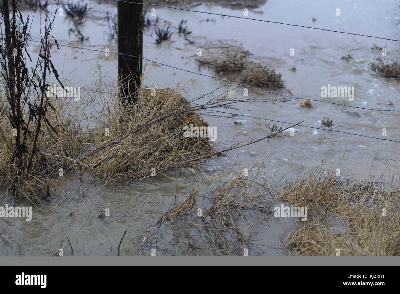 Runoff rushing into fields Stock Photo - Alamy