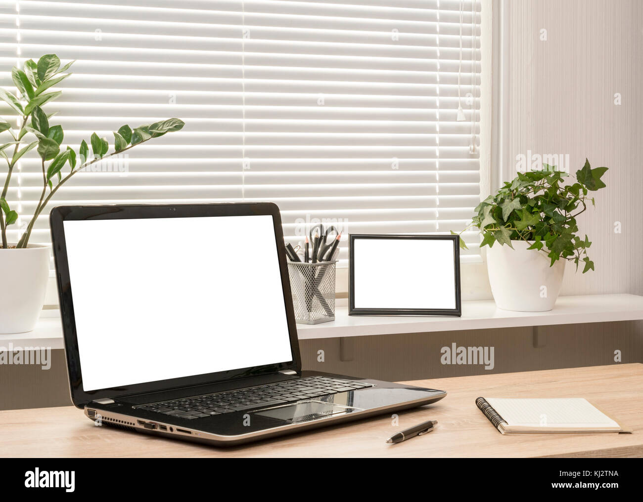 Modern home-office workplace with laptop computer on table, business ...