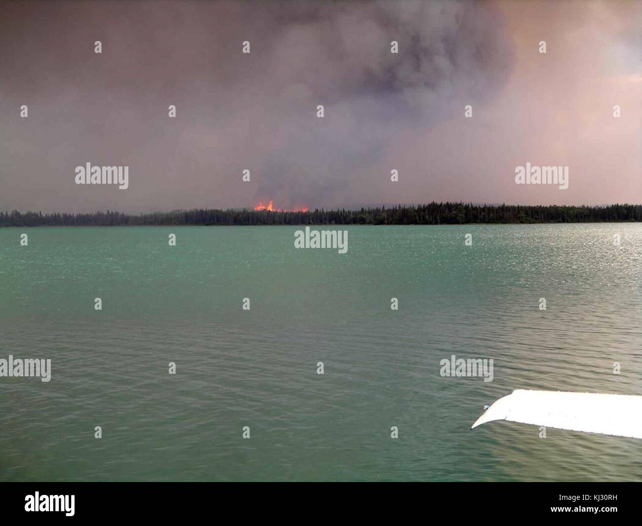 Skilak lake smoke fire Stock Photo - Alamy