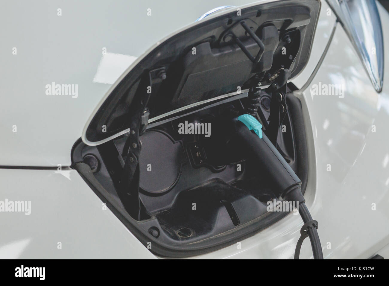 Modern charger plugged electric car hi-res stock photography and images ...