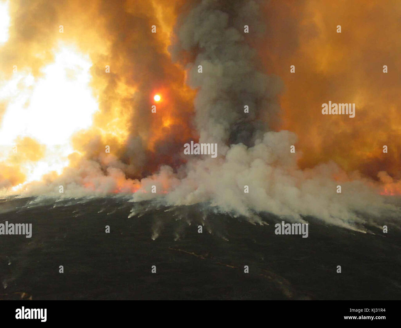 Smoke rises from big burn Stock Photo - Alamy