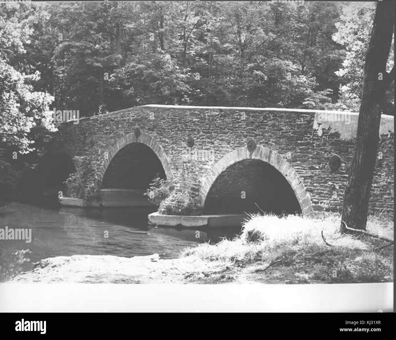 Pond Mill Bridge Stock Photo - Alamy