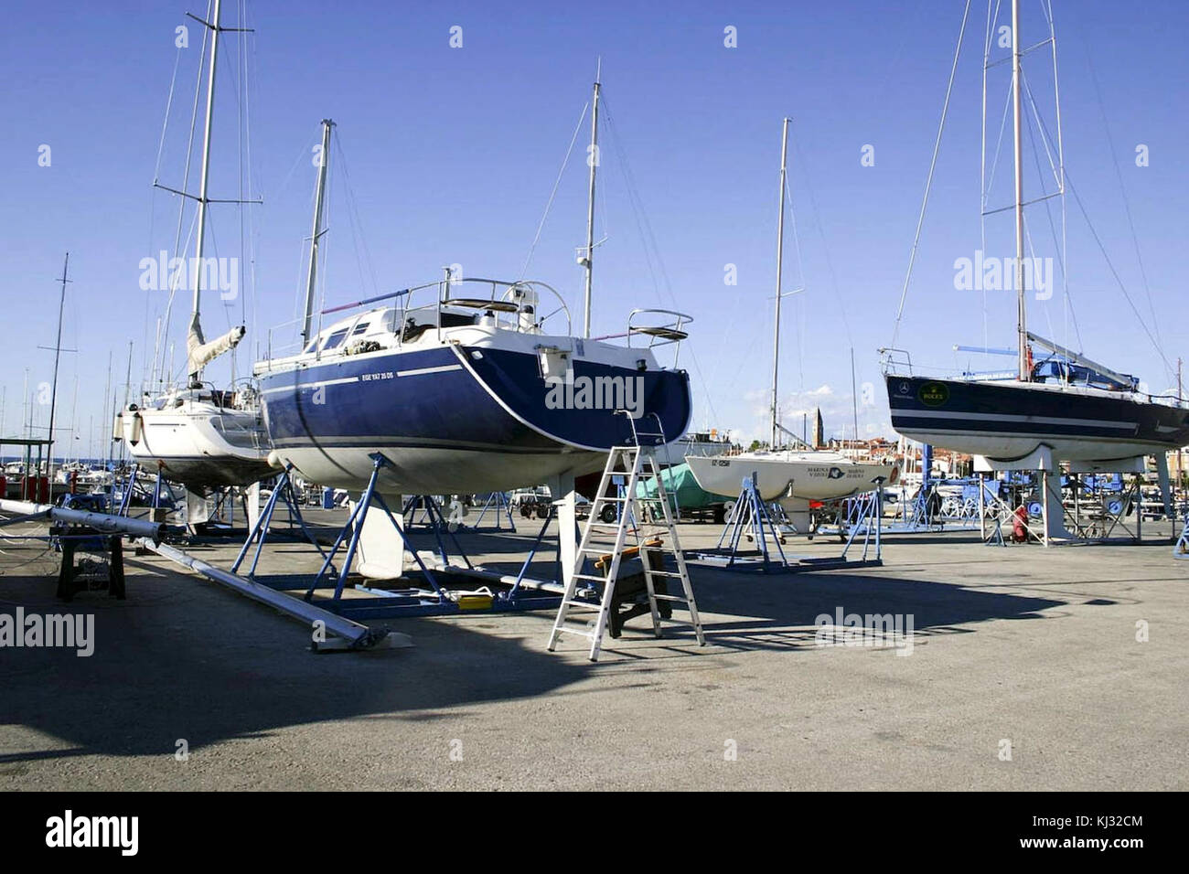 Sailor boat in port Stock Photo - Alamy