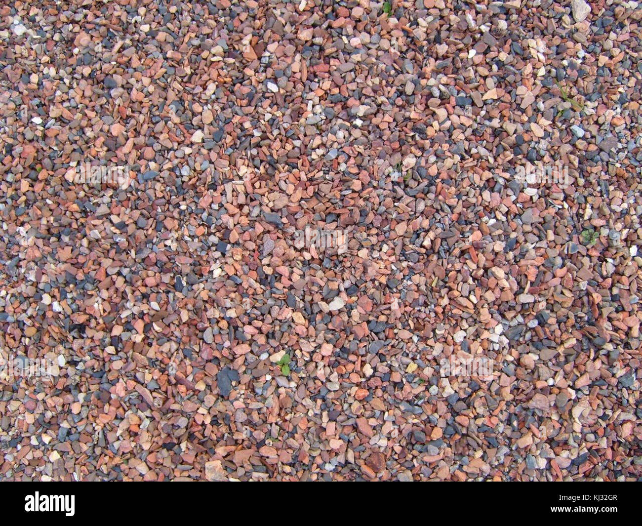 Red pebbles rocks Stock Photo - Alamy