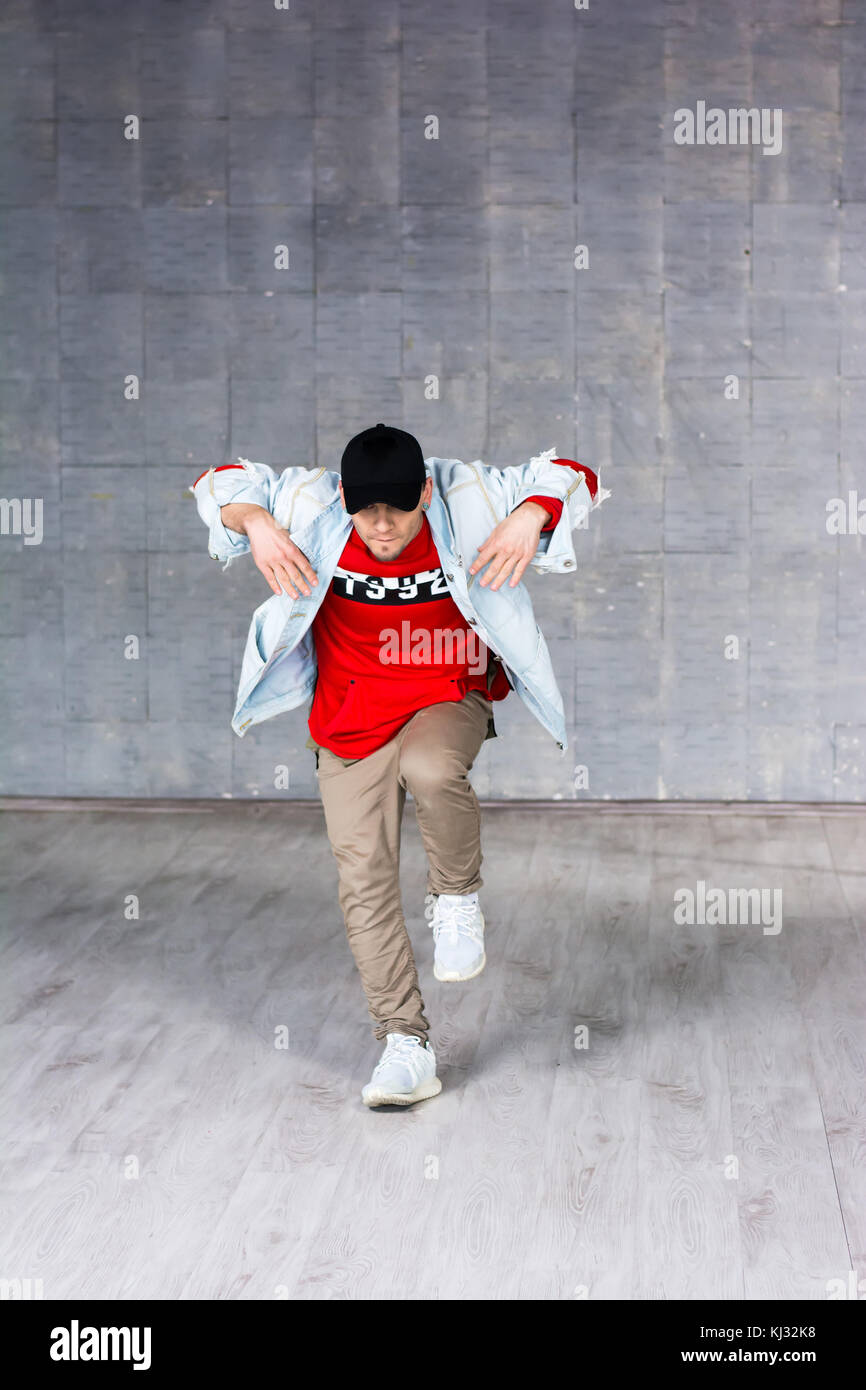 Handsome young man dancing Stock Photo - Alamy