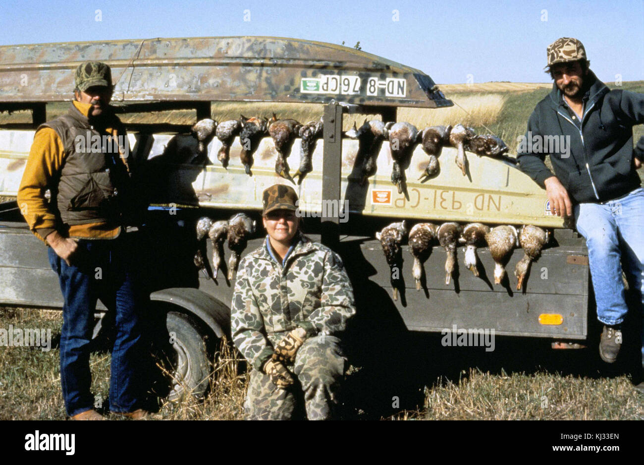 Sport hunters pose with their catch after a successful hunt Stock Photo ...