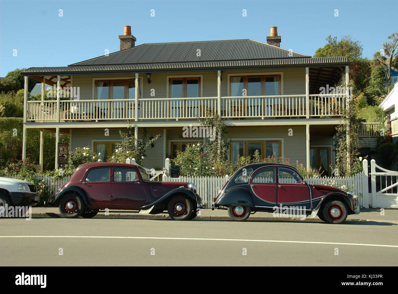 A vintage photograph showing two Citroën cars, reflecting the ...