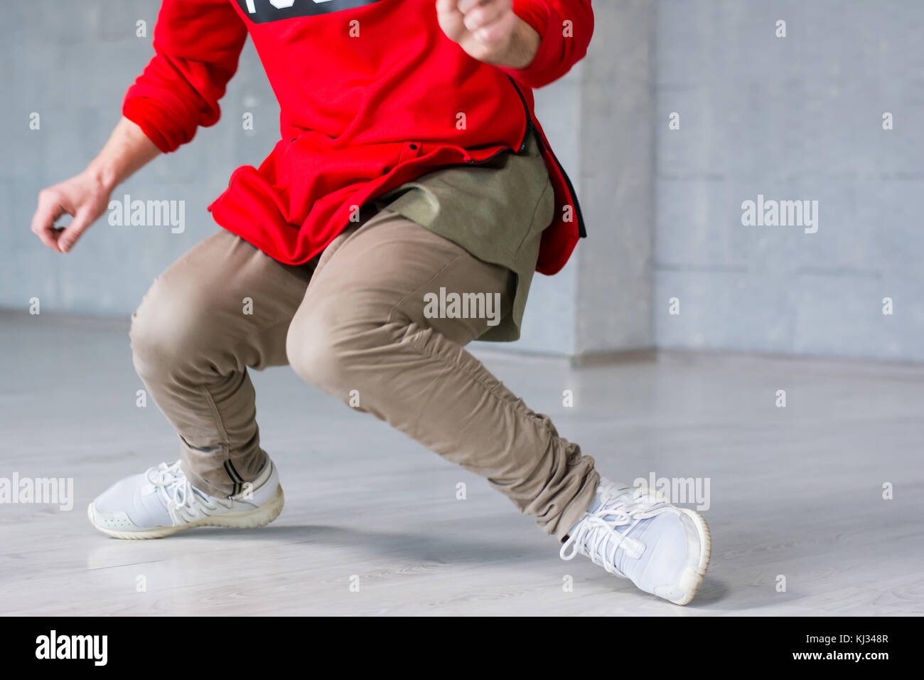 Stylish male hip-hop dancer in action Stock Photo - Alamy
