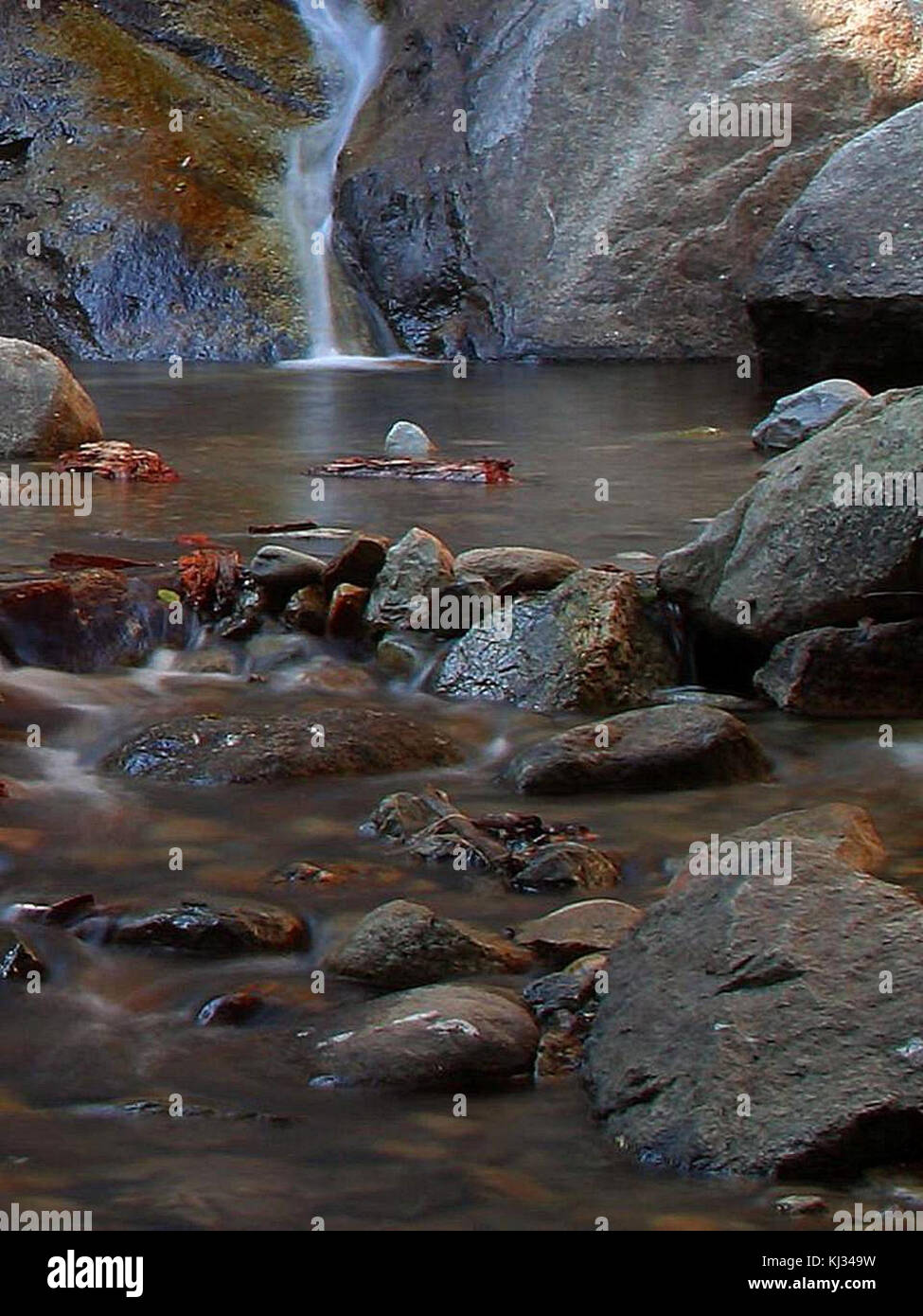 Waterfalls streams rocks Stock Photo - Alamy