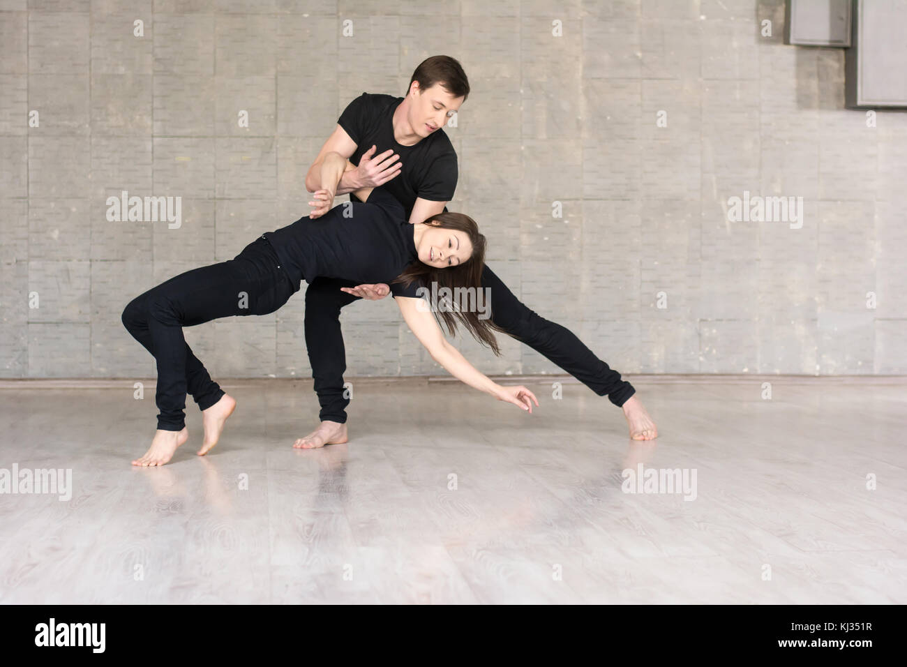 Beautiful couple dancing social dance Stock Photo - Alamy