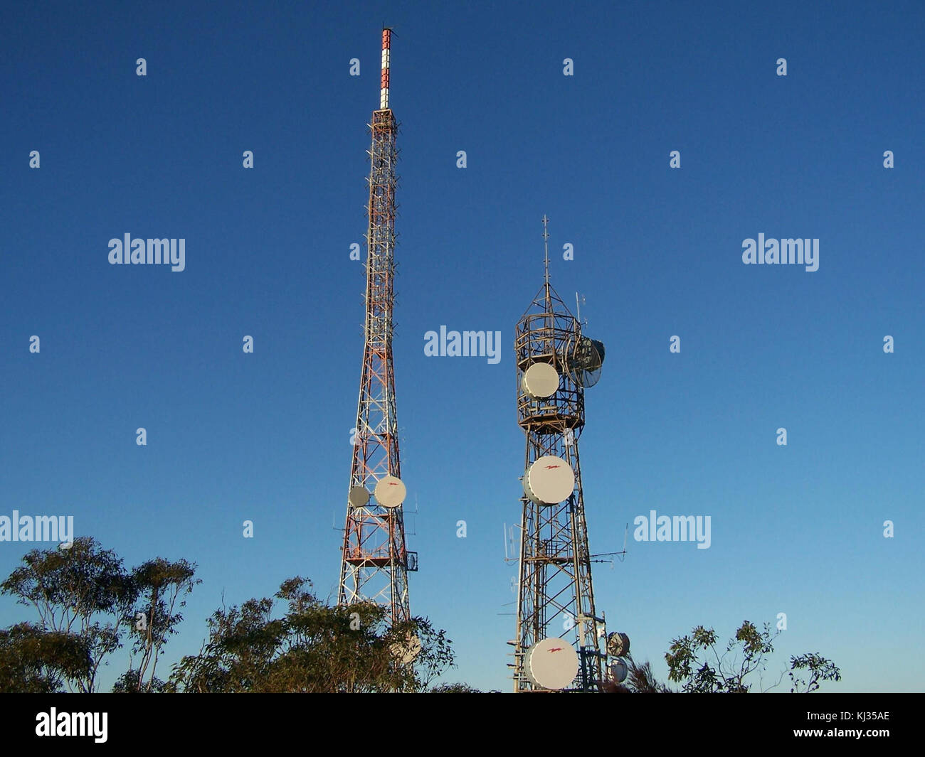 Twin view of communcation towers Stock Photo - Alamy