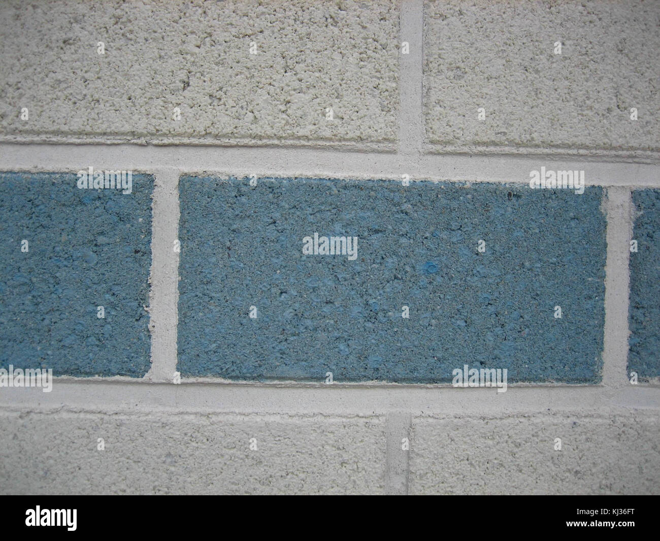 White and blue stone brick wall Stock Photo - Alamy
