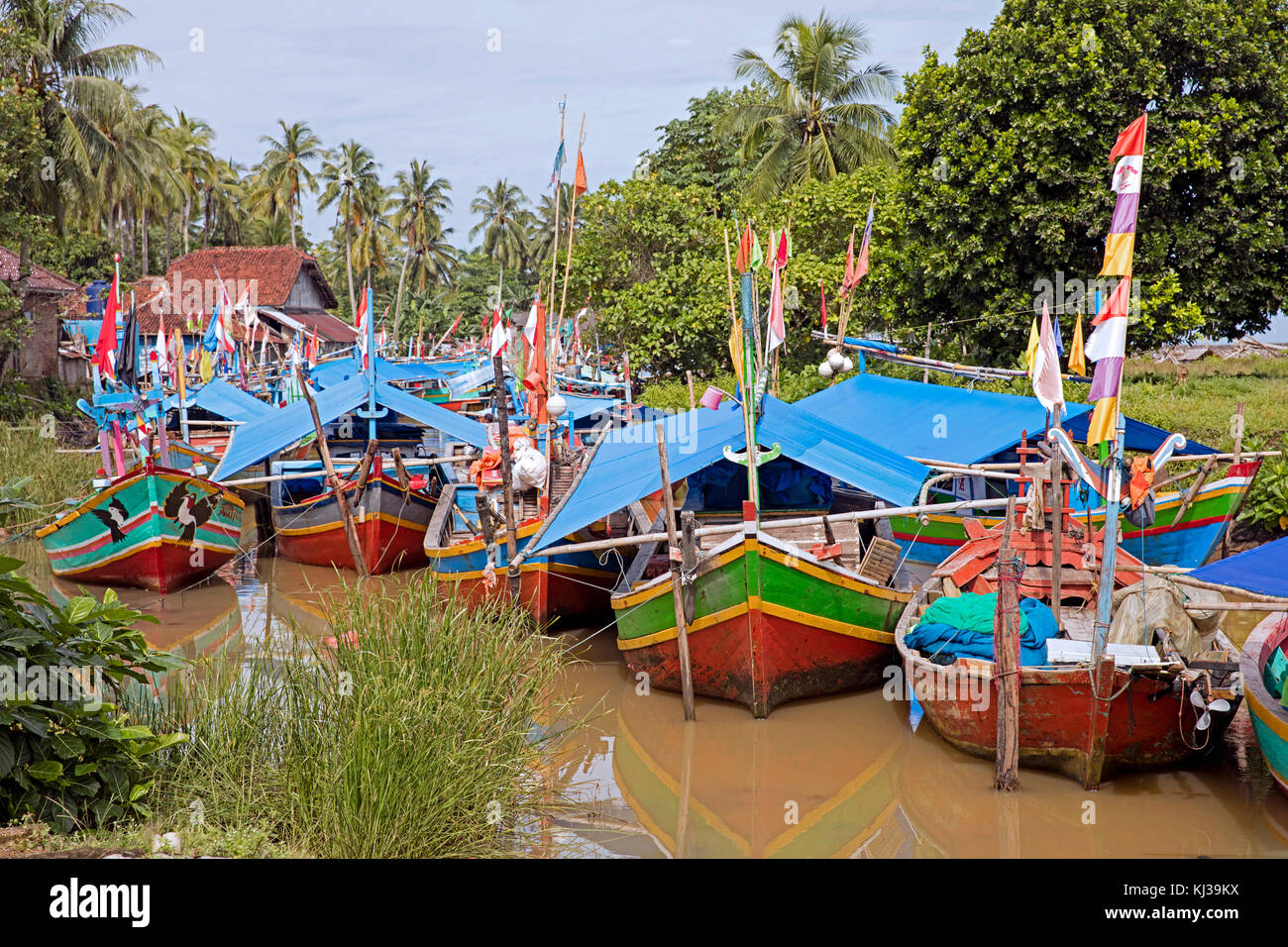 Traditional wooden fishing boats in the coastal town Carita, Pandeglang ...