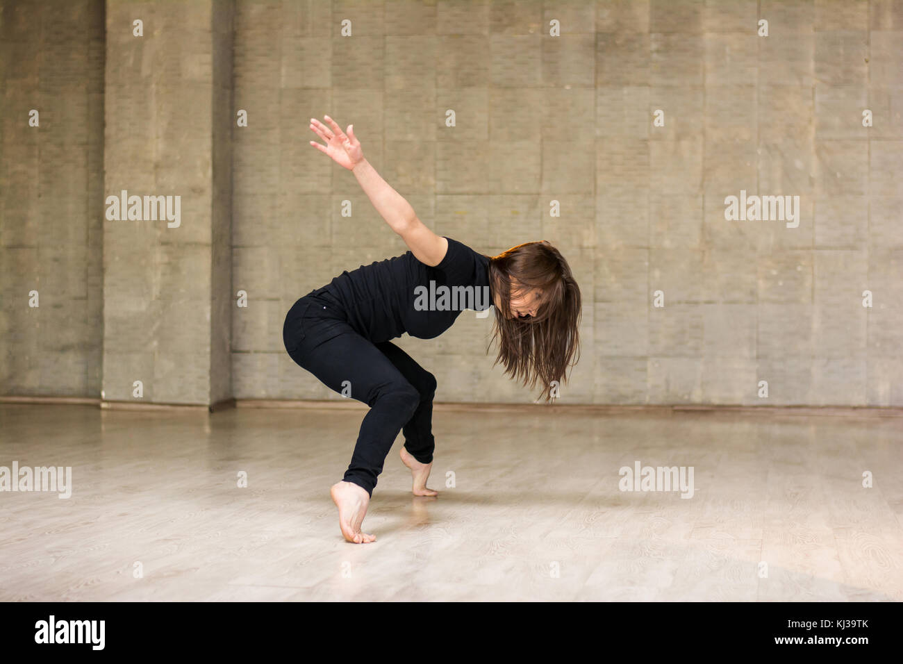 Beautiful young dancer in movement Stock Photo - Alamy