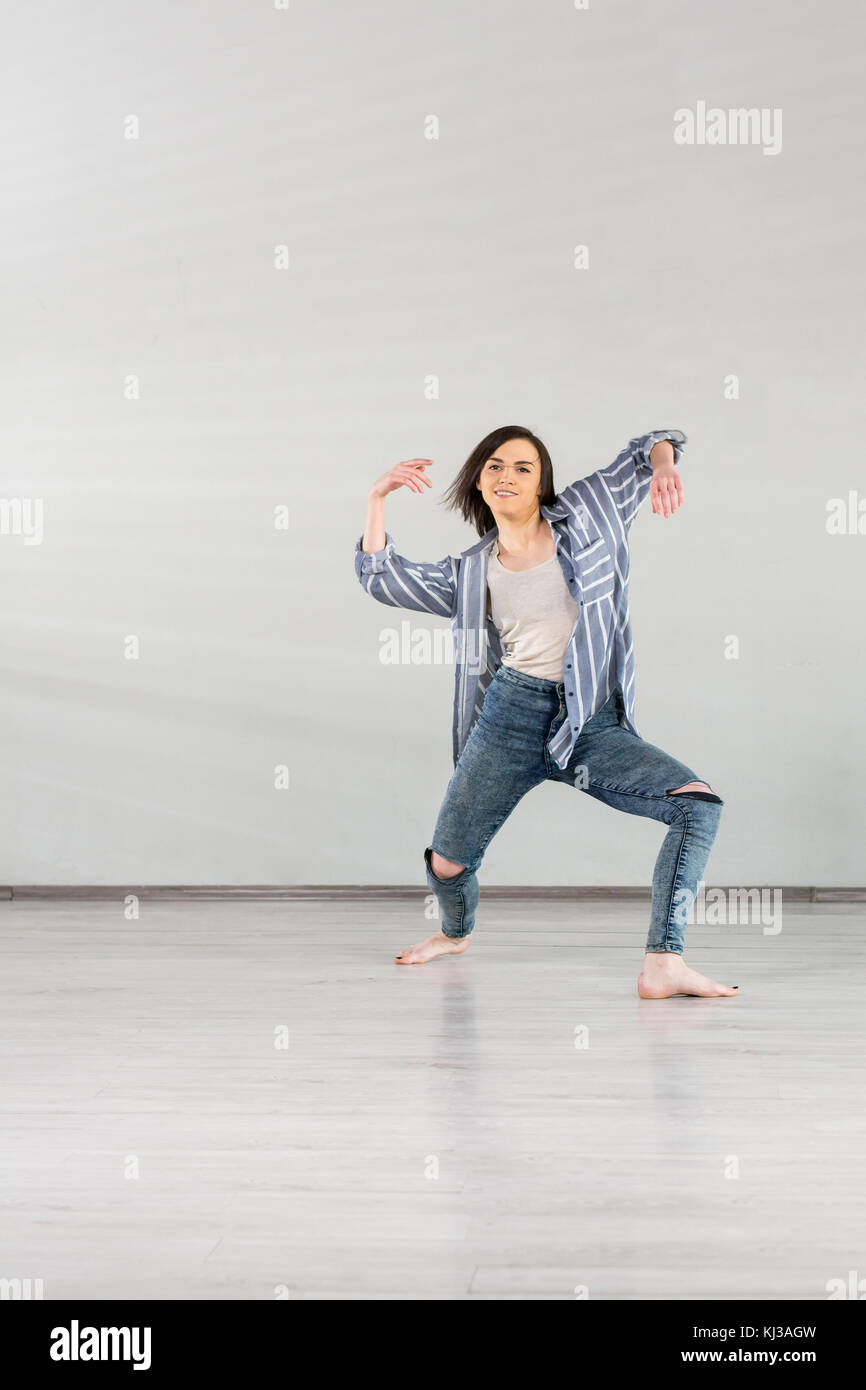 Modern style girl is dancing Stock Photo - Alamy