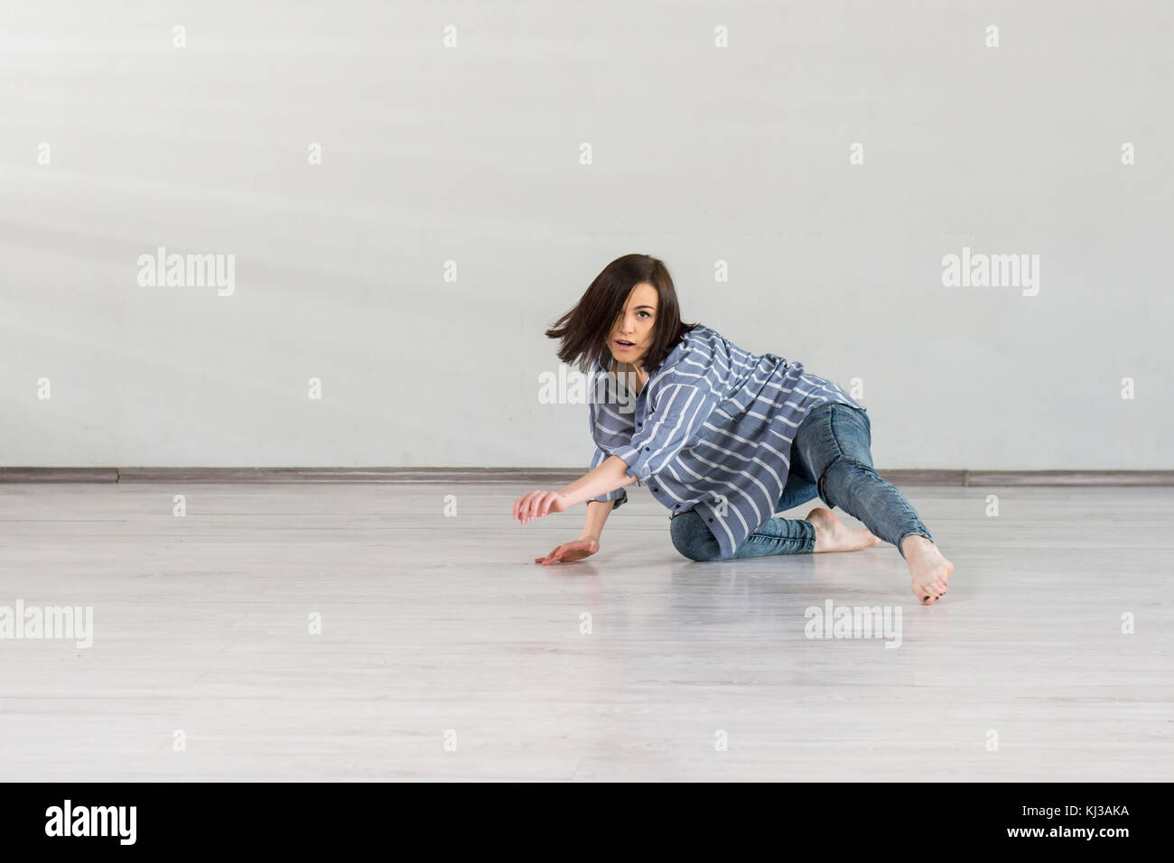 Girl in dynamic dance pose Stock Photo - Alamy