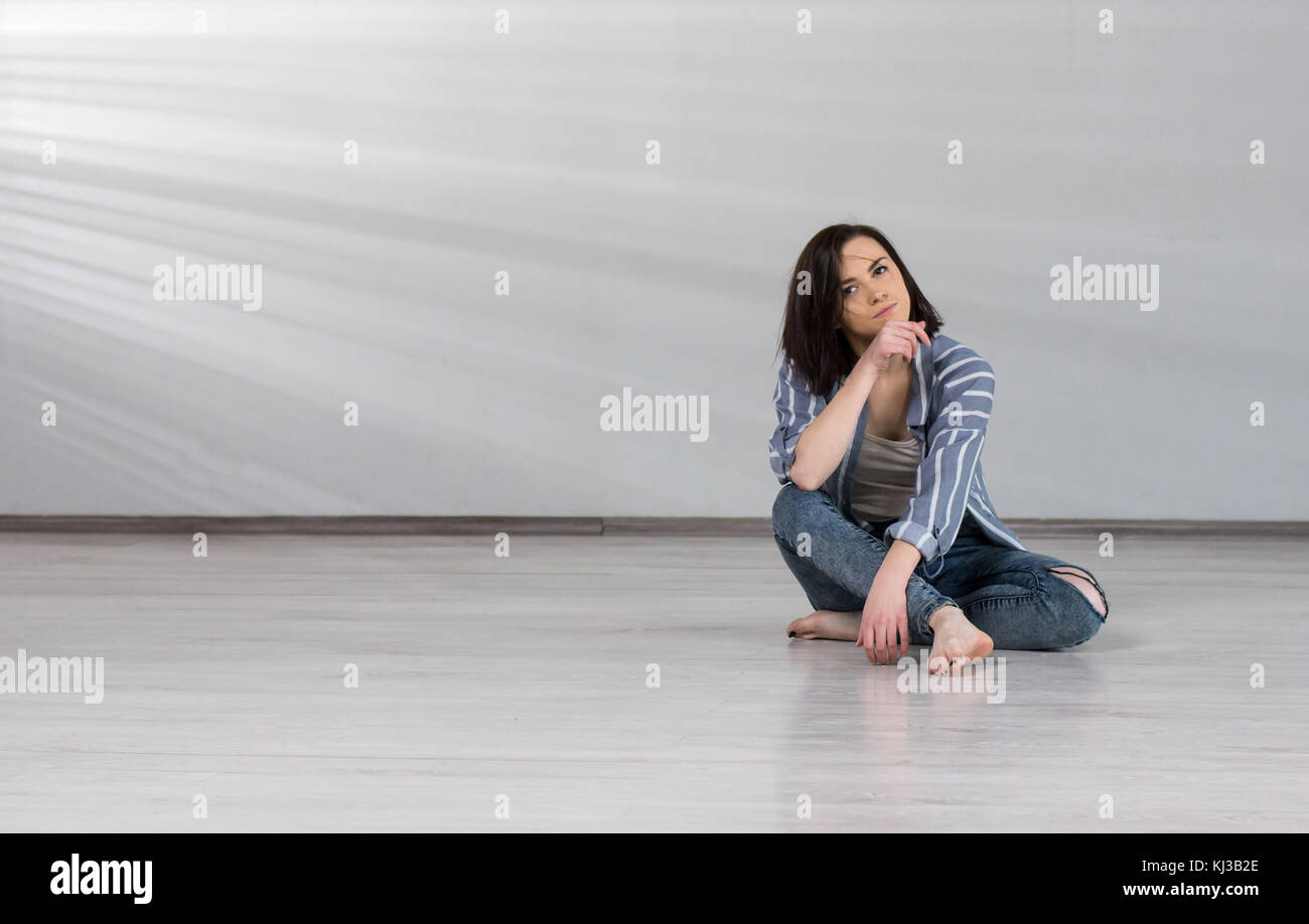 Young female dancer on studio background Stock Photo - Alamy
