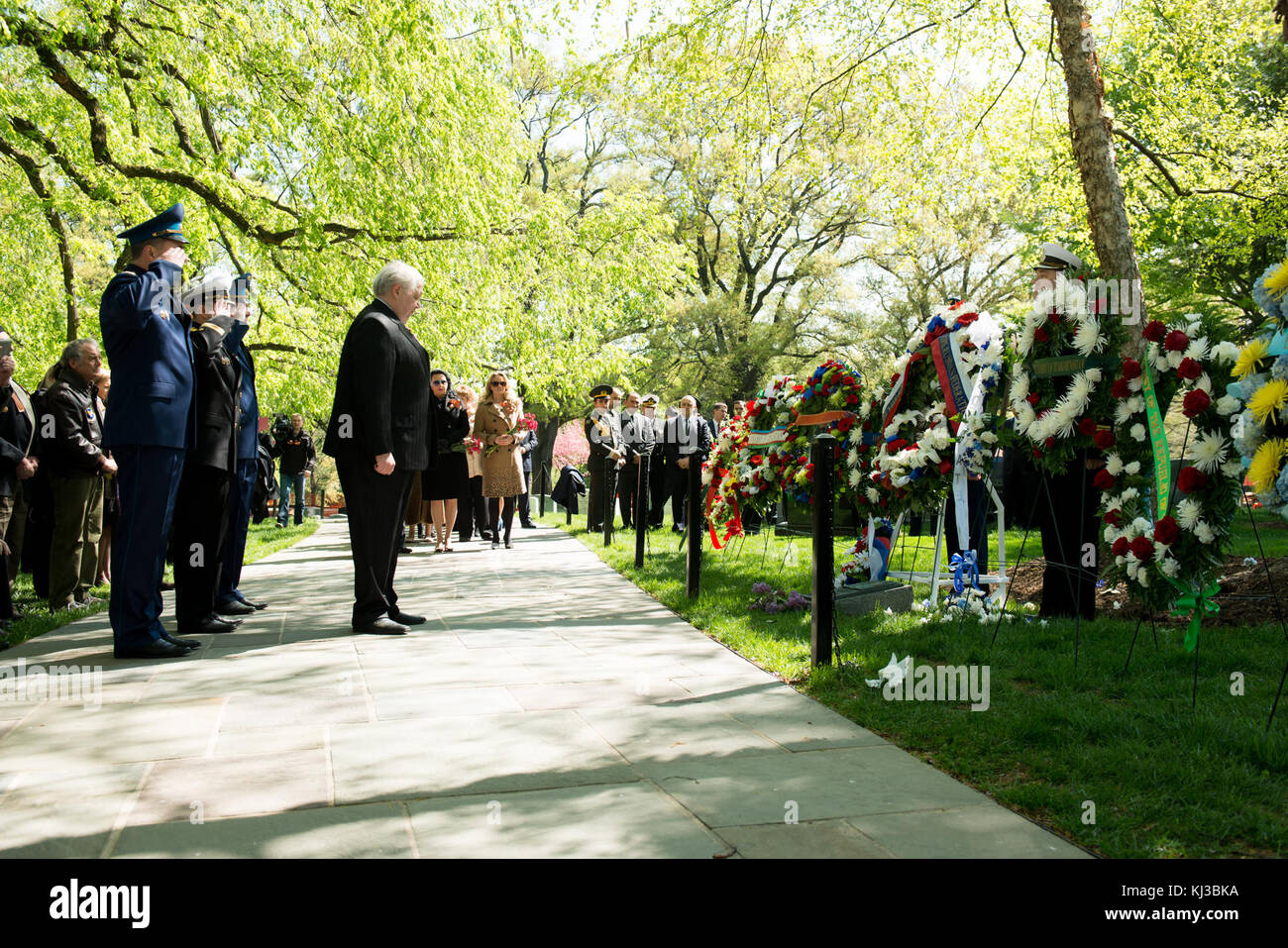 Russian Ambassador Sergey Kislyak bows his head after laying a wreath ...