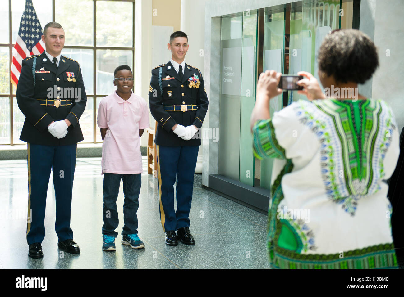 Members of The Old Guard pose for photographs in the Welcome Center of ...