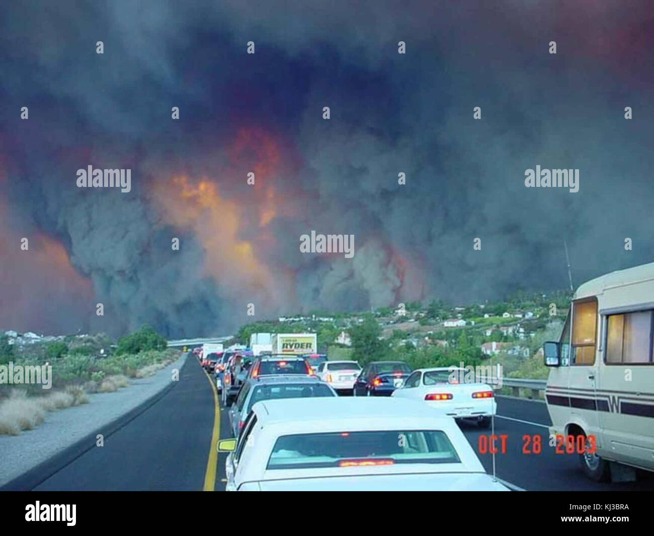 Big smoke and fire rising above highway Stock Photo - Alamy