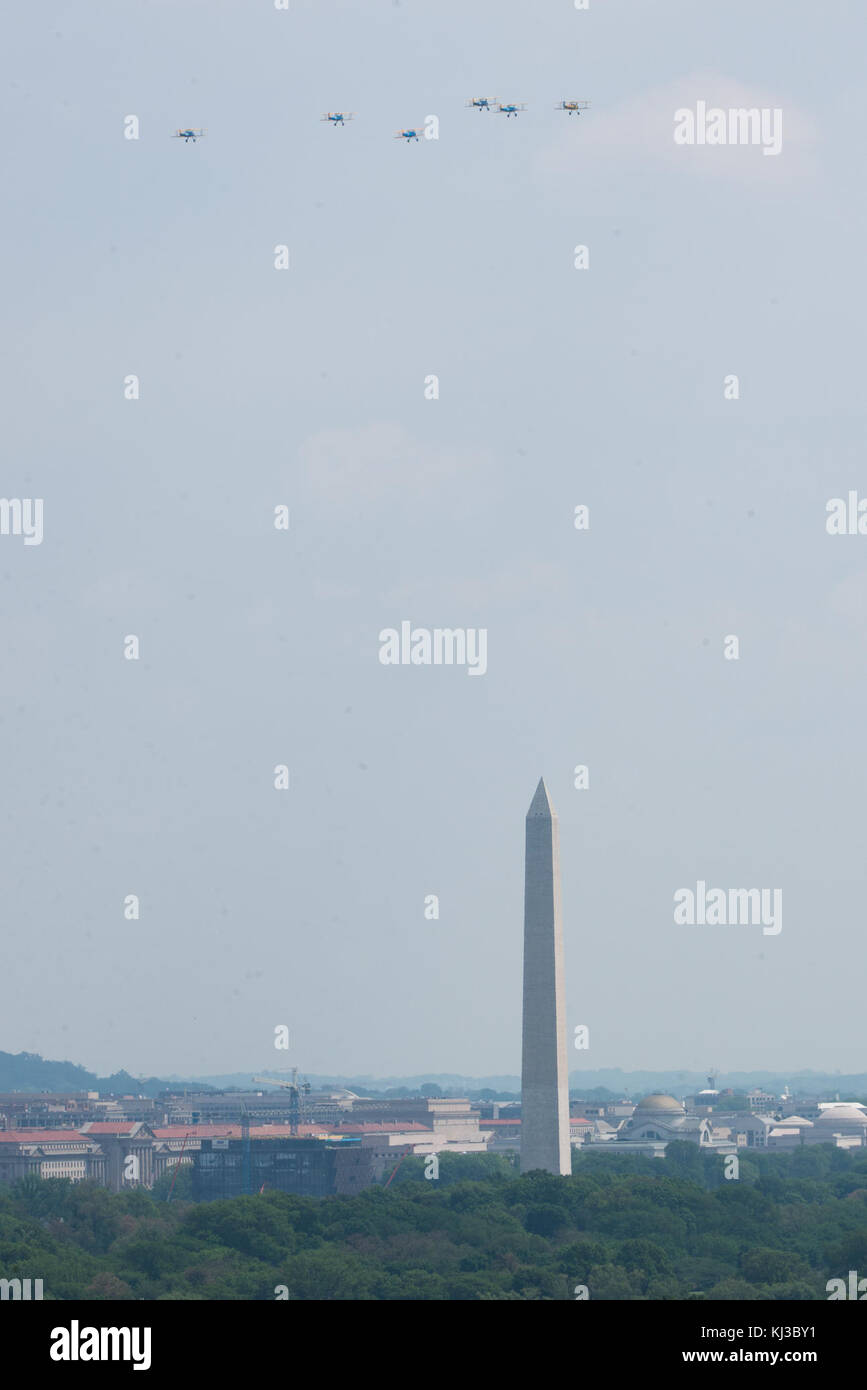World War II era planes fly over Washington, D.C. seen from Arlington ...