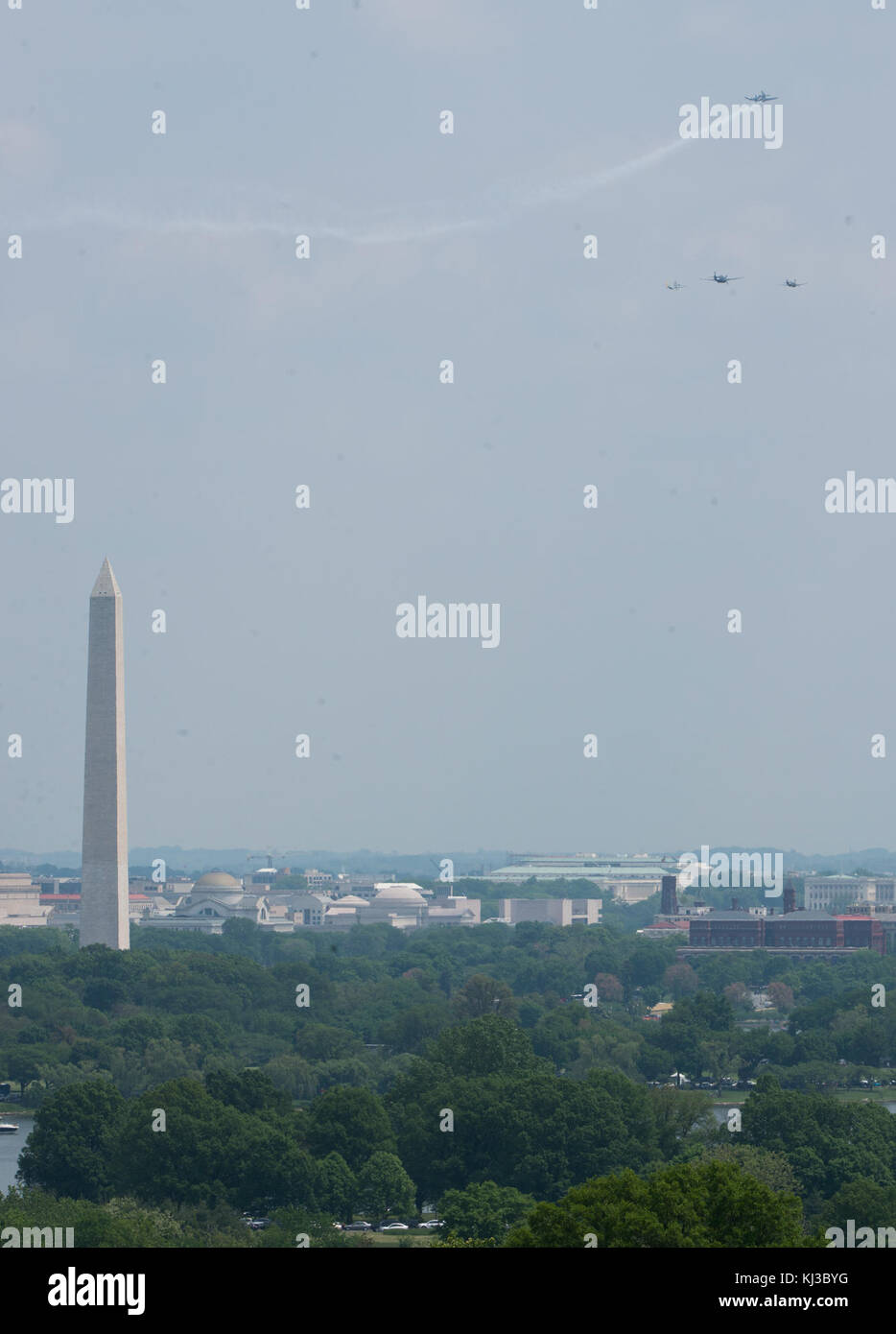 World War II era planes fly over Washington, D.C. seen from Arlington ...