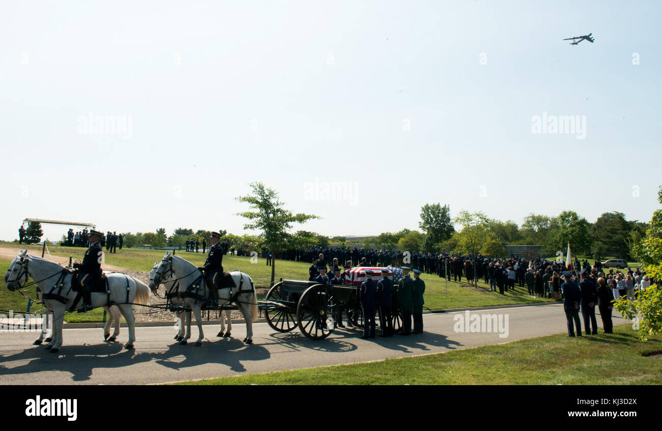 This photograph captures the graveside service for James C. Binnicker ...