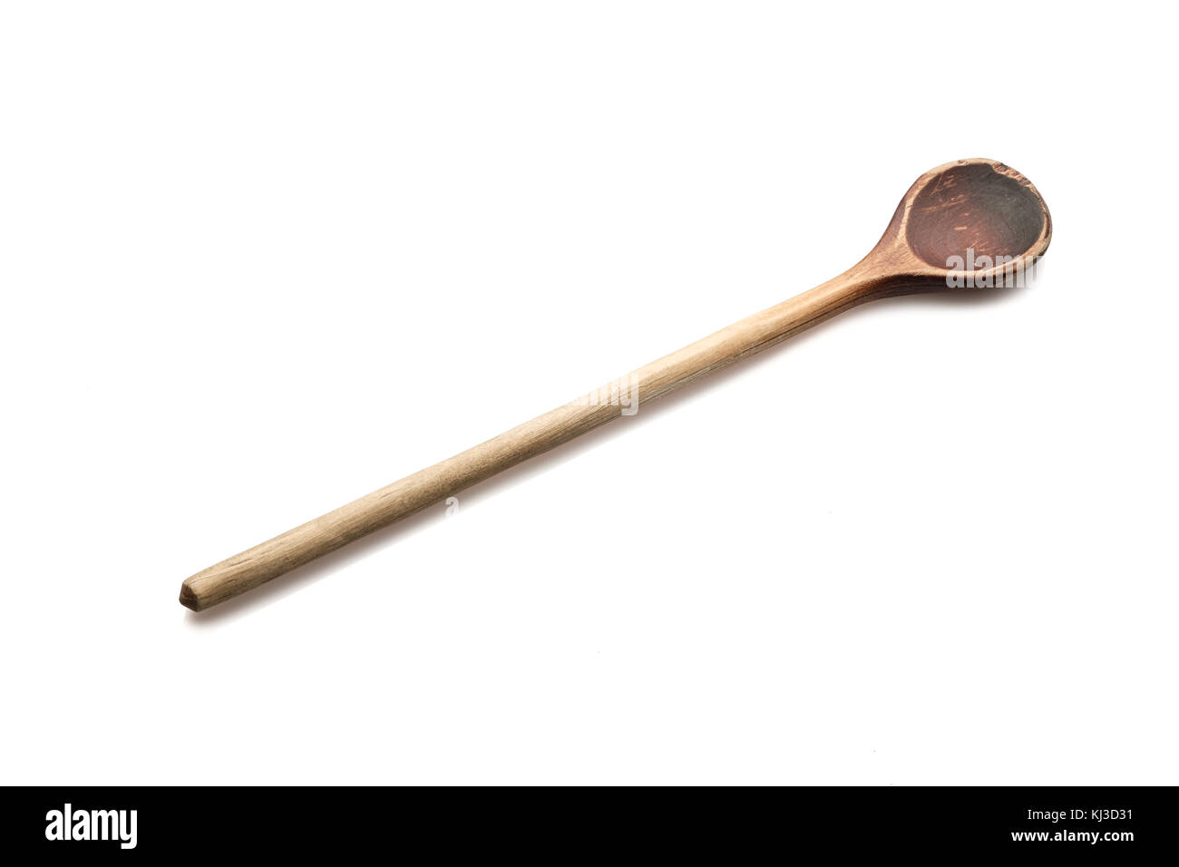 Used rustic object wooden spoon on white Stock Photo - Alamy
