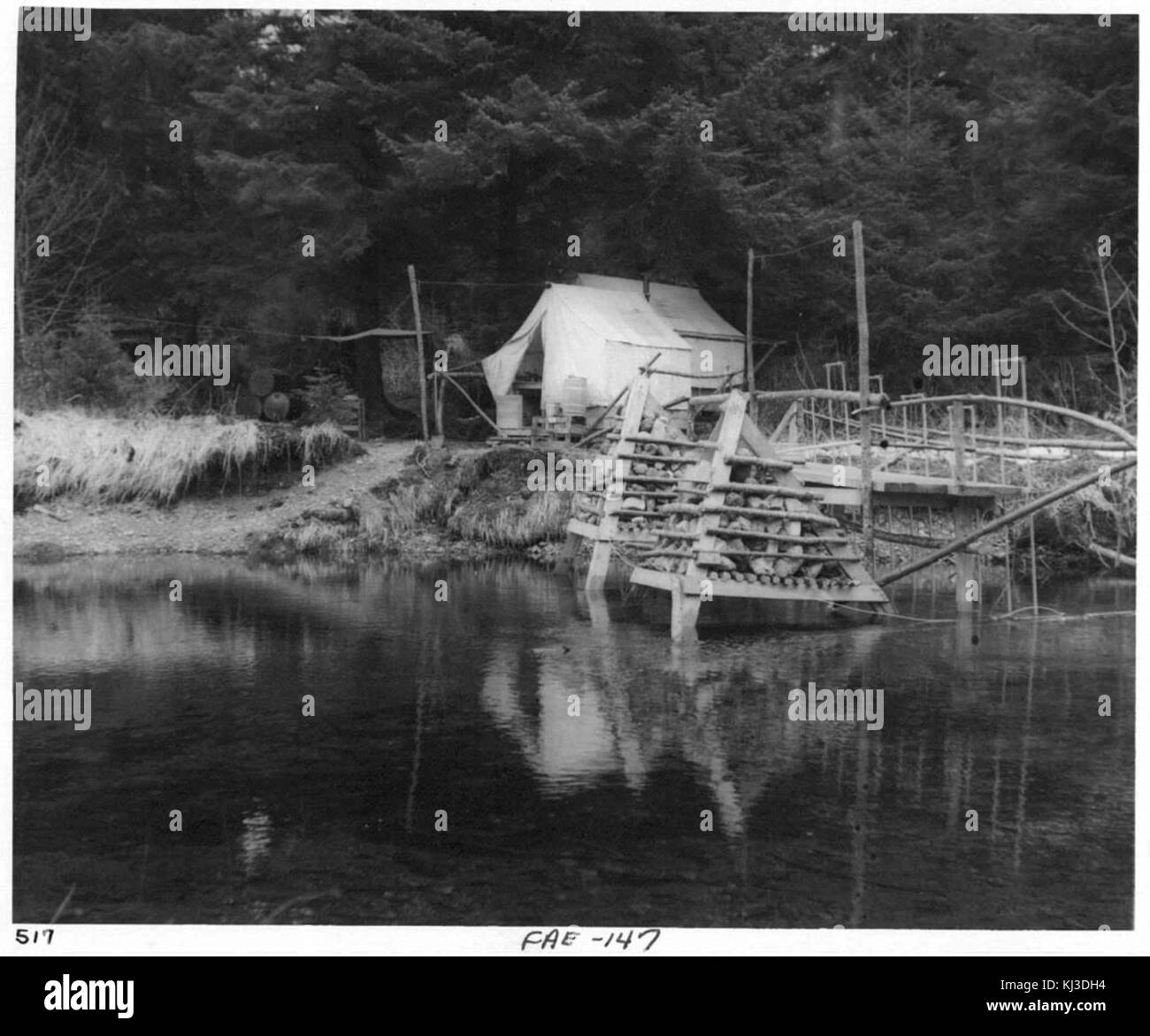 Vintage photo of downstream migrant station Stock Photo - Alamy