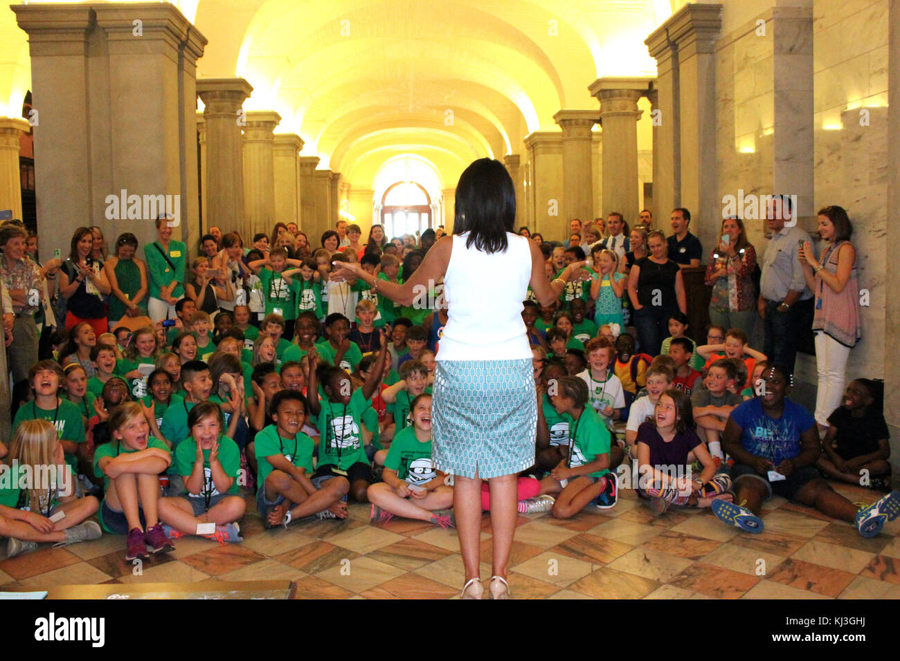 This image features Nikki Haley at Sara Collins Elementary School ...