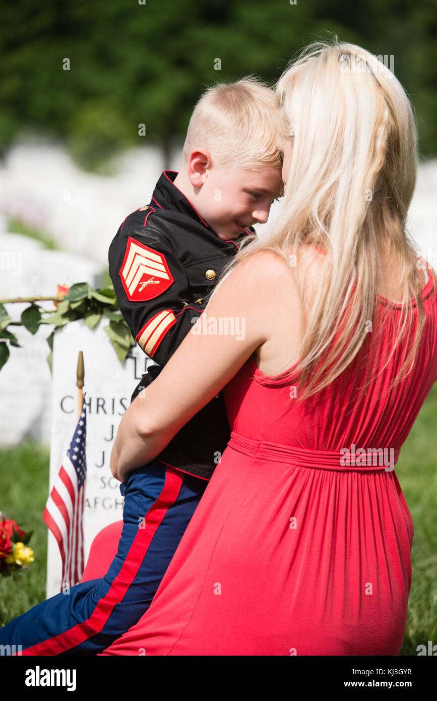 This image captures a Memorial Day ceremony at Arlington National ...