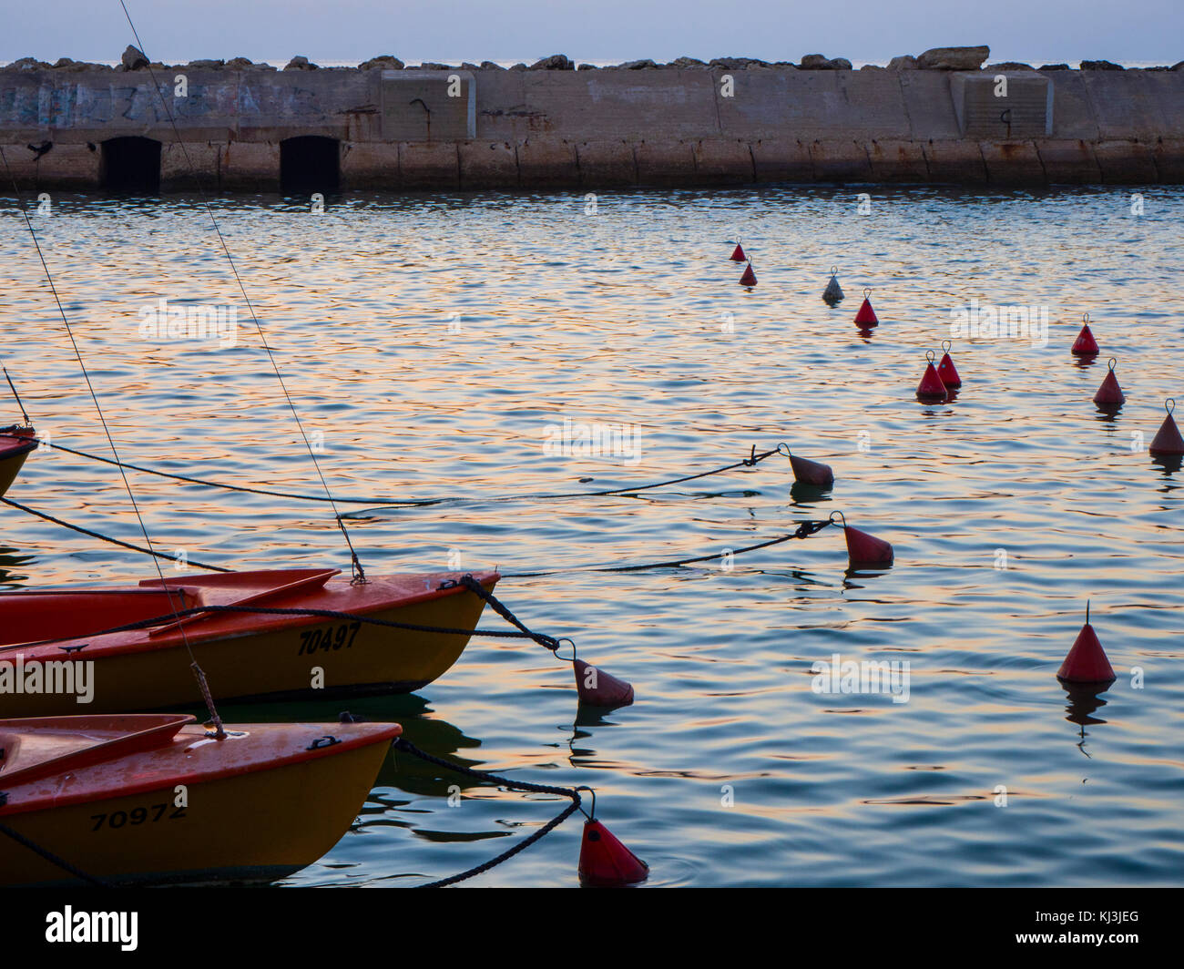 Docking sail boats and floats at the port Stock Photo - Alamy