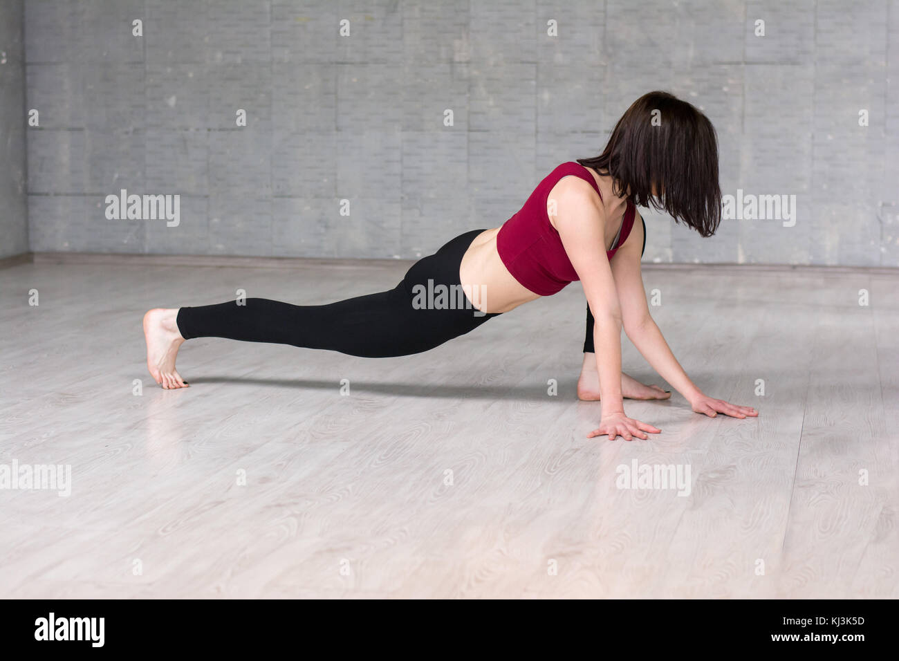 Young woman practicing yoga Stock Photo - Alamy