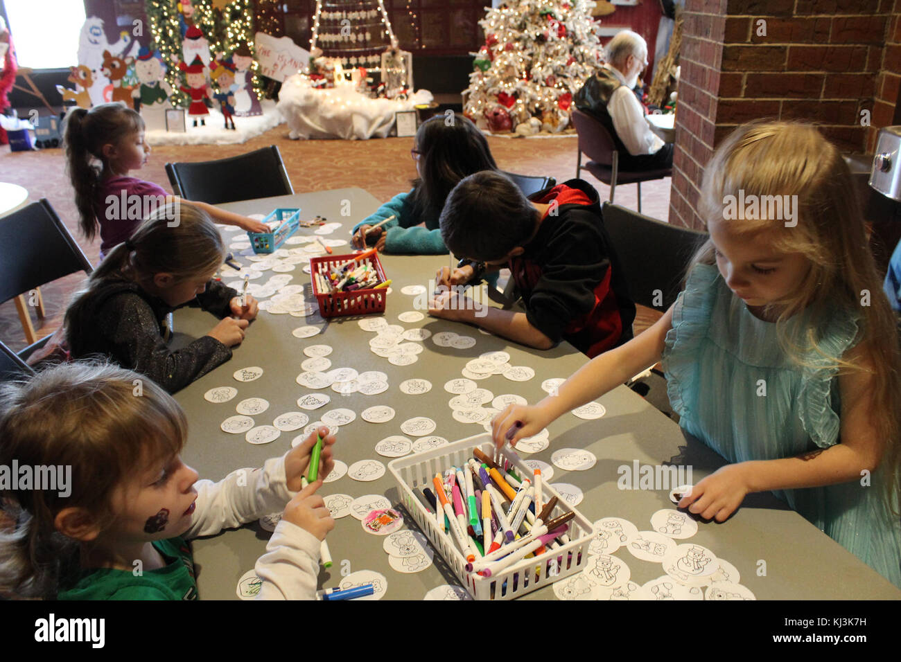 This photograph captures a Teddy Bear Bash event, showcasing the joy ...