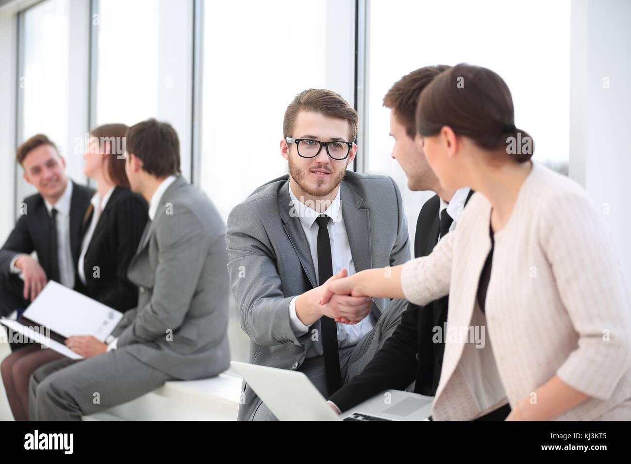 handshake colleagues at meeting in office Stock Photo - Alamy
