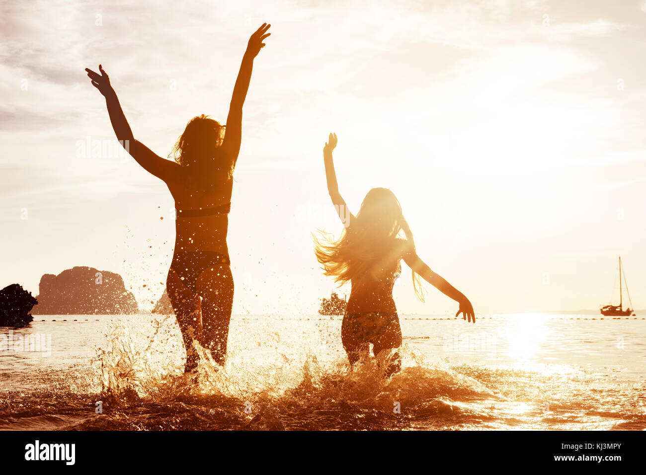 Happy tropical beach holidays sunset Stock Photo - Alamy