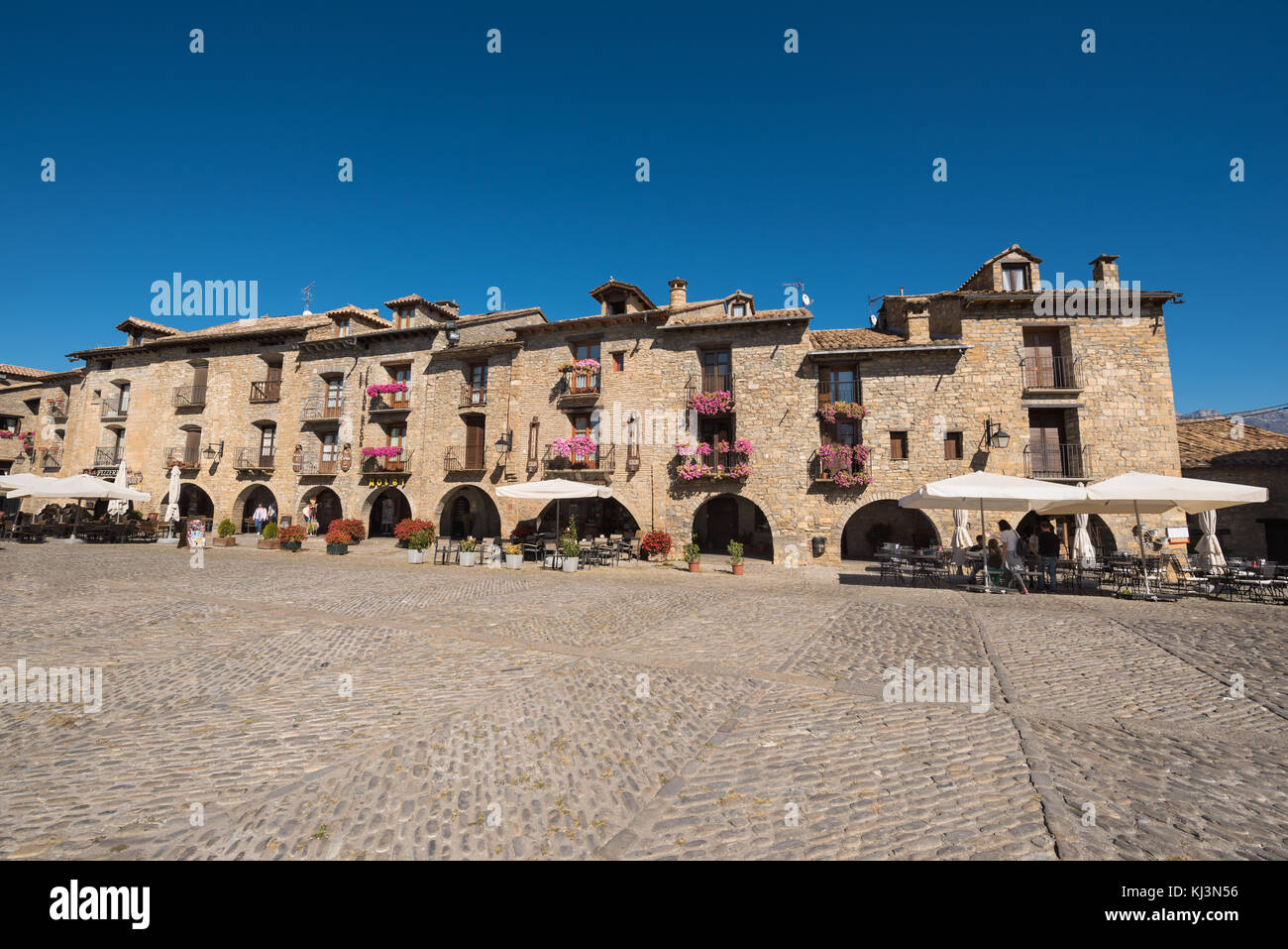 Ainsa, Spain - October 9, 2017: Tourist visiting main square of Ainsa ...