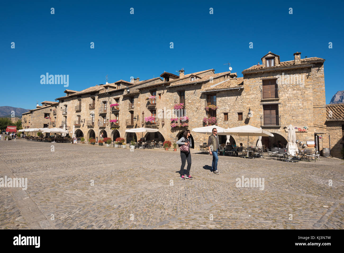 Ainsa, Spain - October 9, 2017: Tourist visiting main square of Ainsa ...