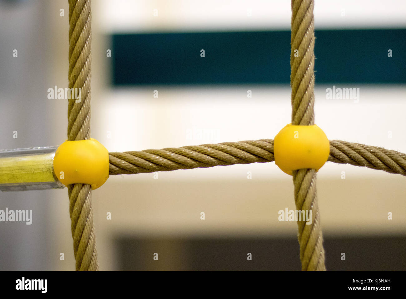 Yellow ropes with blur background Stock Photo - Alamy