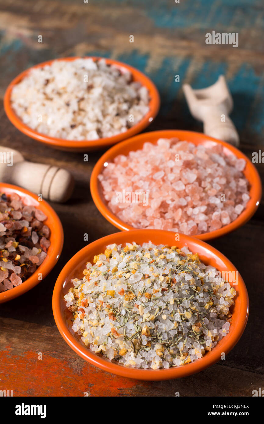 Variety of sea salt, pink Himalayan salt, colorful salt with dried ...