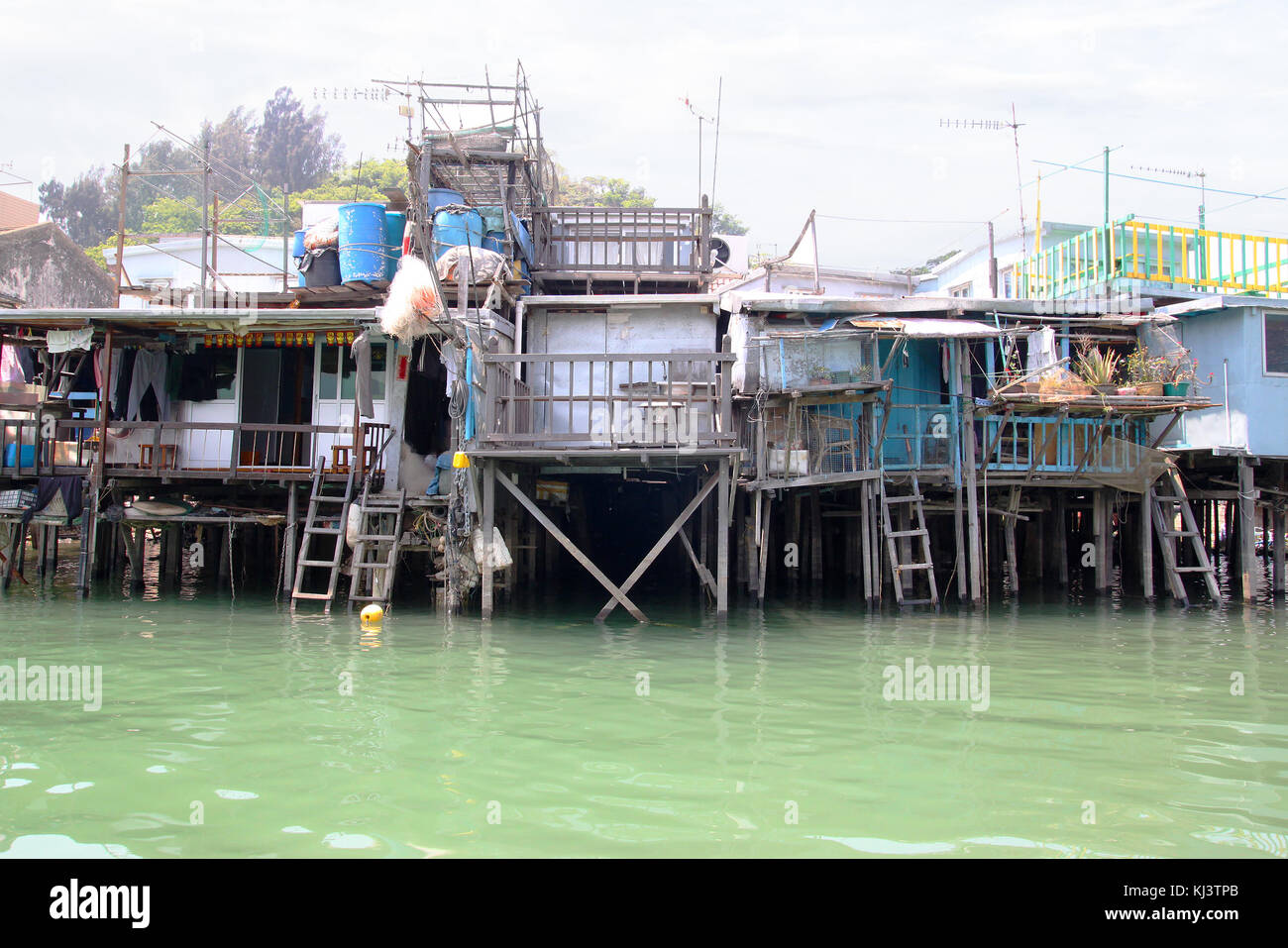 Rows of traditional wooden stilt houses in Tai O, a fishing town on ...