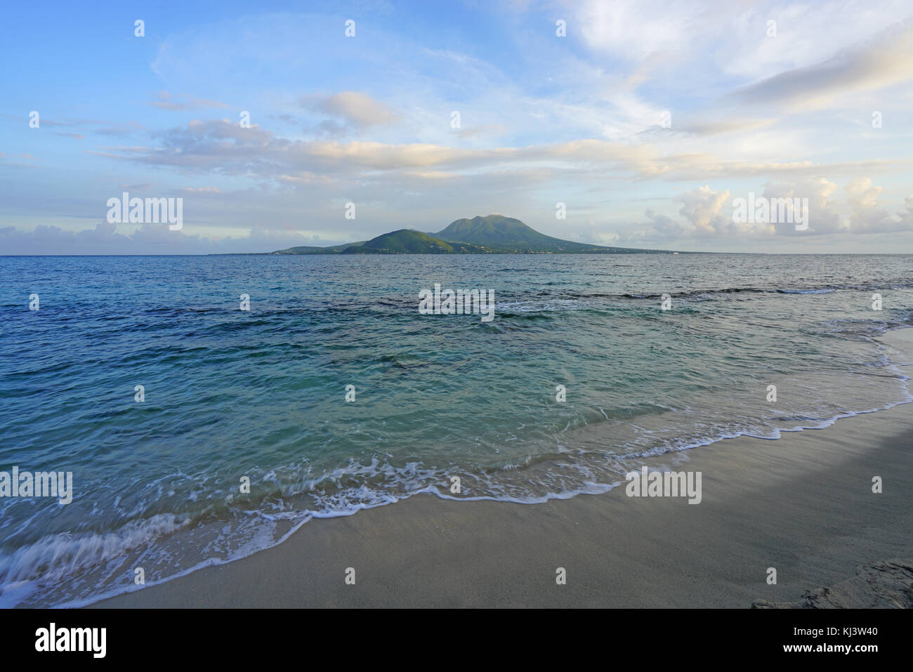 View of the Nevis Peak volcano across the water from St Kitts Stock ...