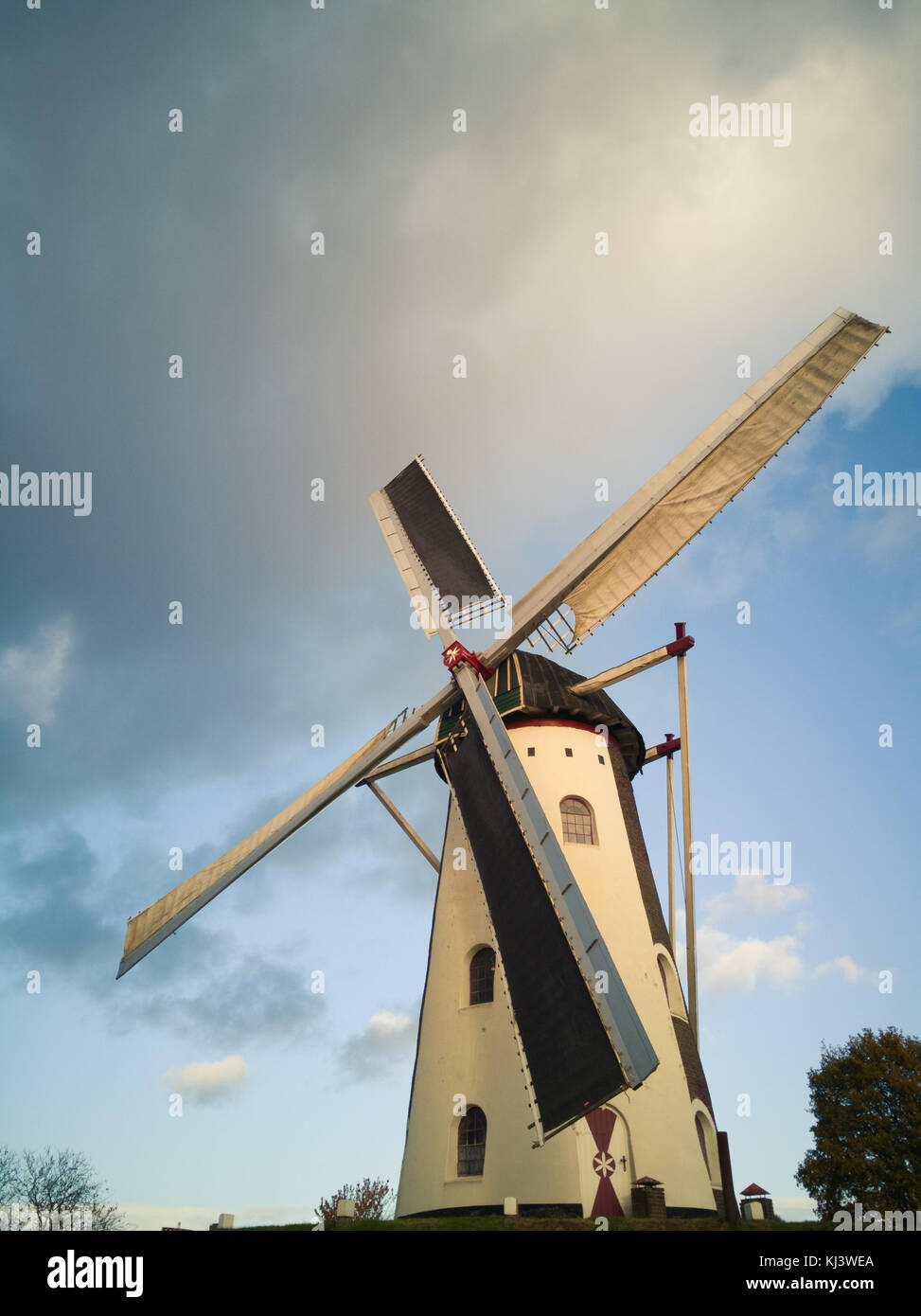 Old traditional wind mill in Brabant, the Netherlands with blue sky ...