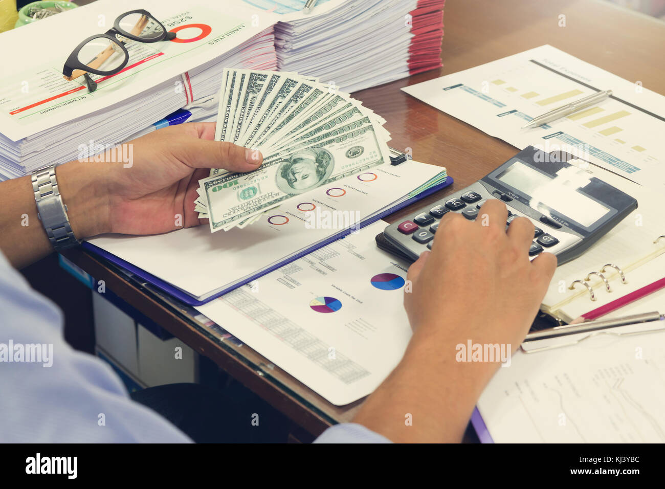 Business and finance concept of office working, Businessman holding ...