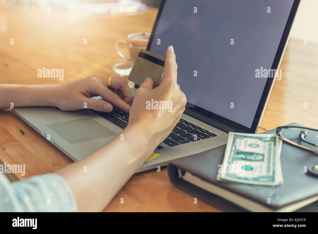 Online shopping concept, Woman shopping using laptop pc and credit card ...