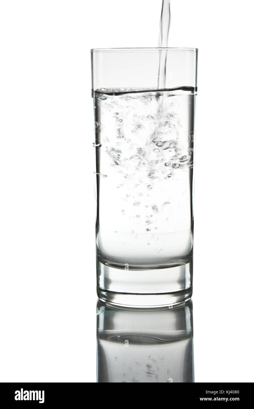 mineral water being poured into a glass Stock Photo - Alamy